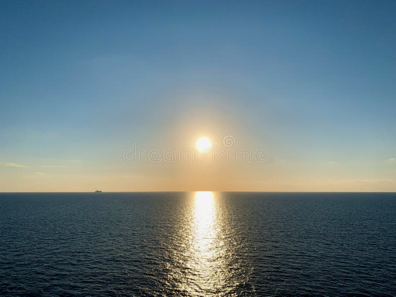 Ocean Horizon with Sun and Its Reflection Stock Photo - Image of ship ...
