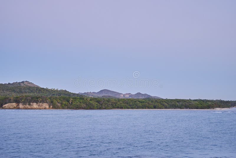Ocean with an Island on the Horizon and Waves Stock Image - Image of ...