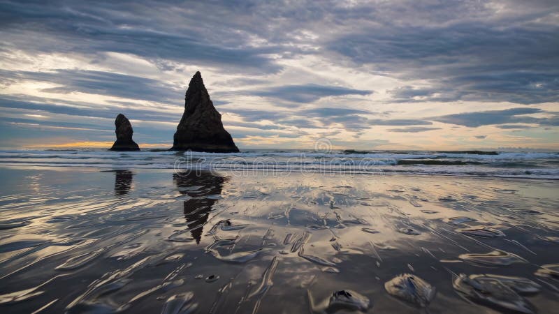 Ocean Landscape with Dramatic Stone Formations and Cloudy Sky Creates ...