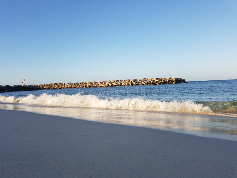 Waves at the shore stock image. Image of blue, view, beach - 85326687