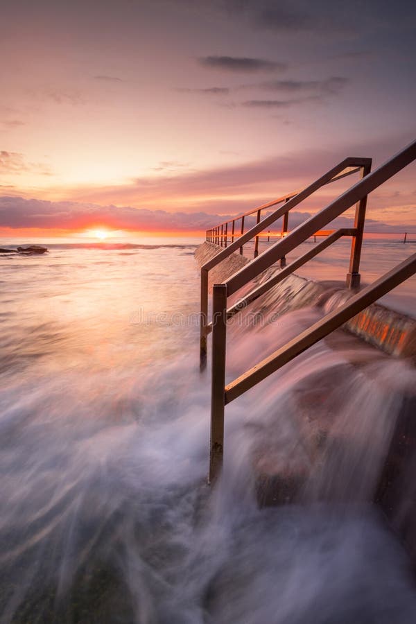 Ocean Overflows Gush Forth Down the Rockpool Steps Stock Photo - Image ...