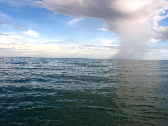 Ocean Rain stock photo. Image of clouds, blue, rain, skies - 6202620