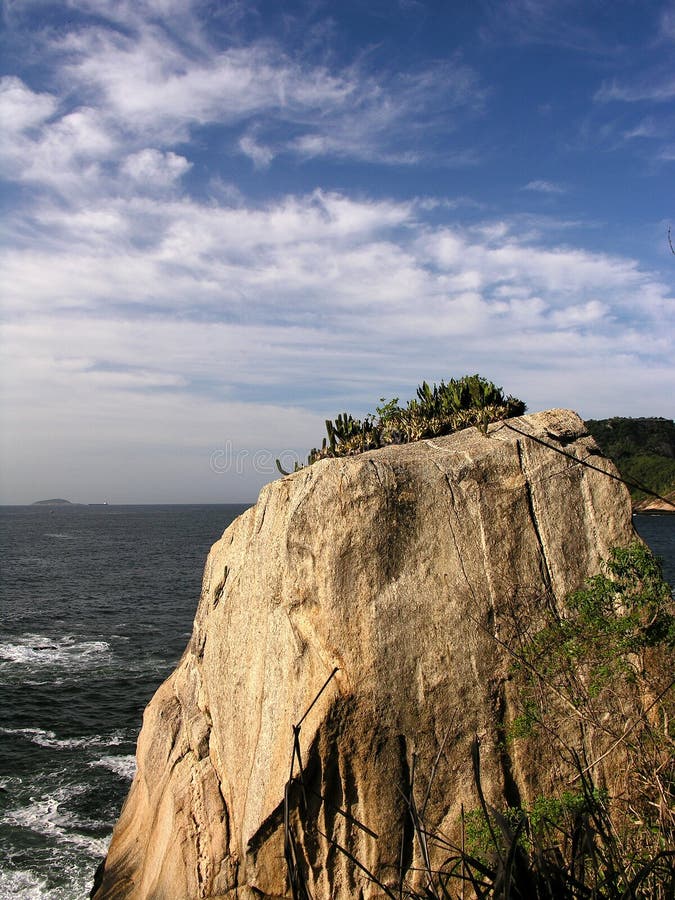 Ocean rock stock photo. Image of colour, ocean, reflection - 390188