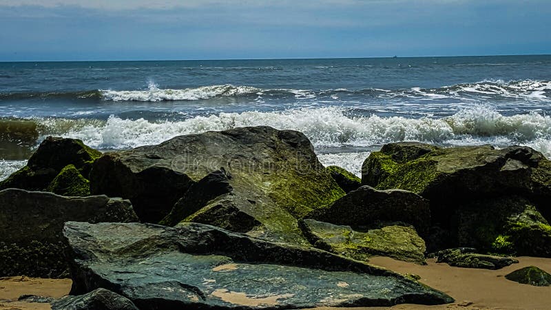 Ocean rocks stock image. Image of sand, ocean, beach - 153474423