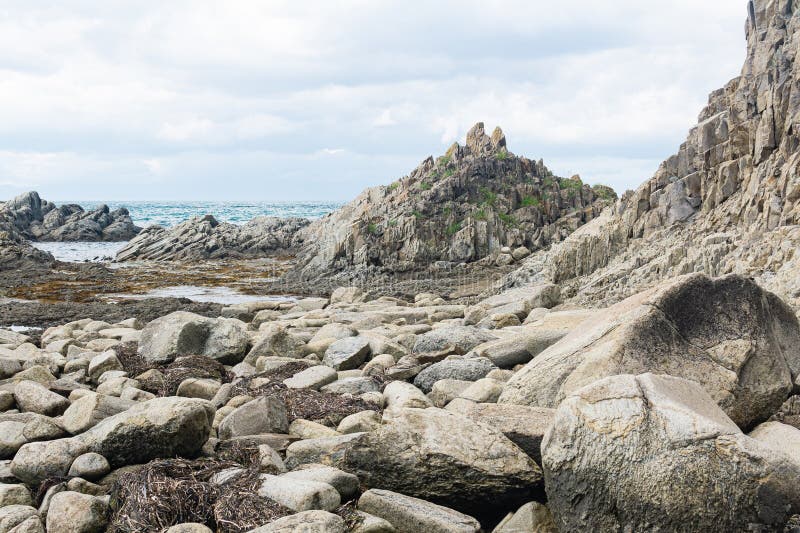 Ocean Shore with Rocks of Columnar Basalt, Cape Stolbchaty on Kunashir ...