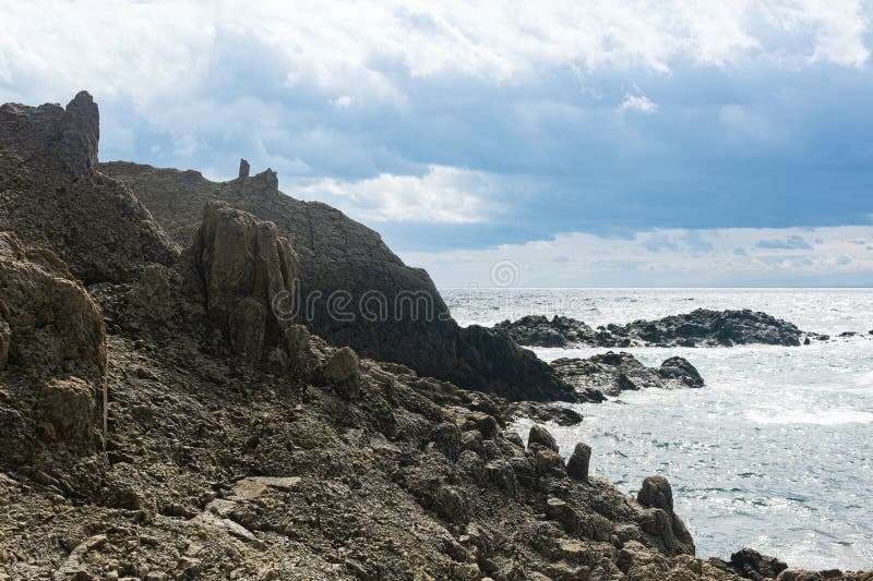 Ocean Shore with Rocks of Columnar Basalt, Cape Stolbchaty on Kunashir ...