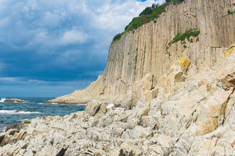 Ocean Shore with Rocks of Columnar Basalt, Cape Stolbchaty on Kunashir ...