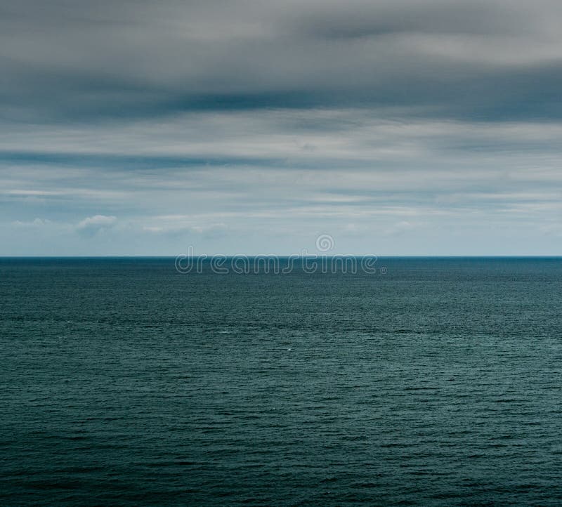 Ocean and Sky Landscape with Expressive Clouds Stock Image - Image of ...