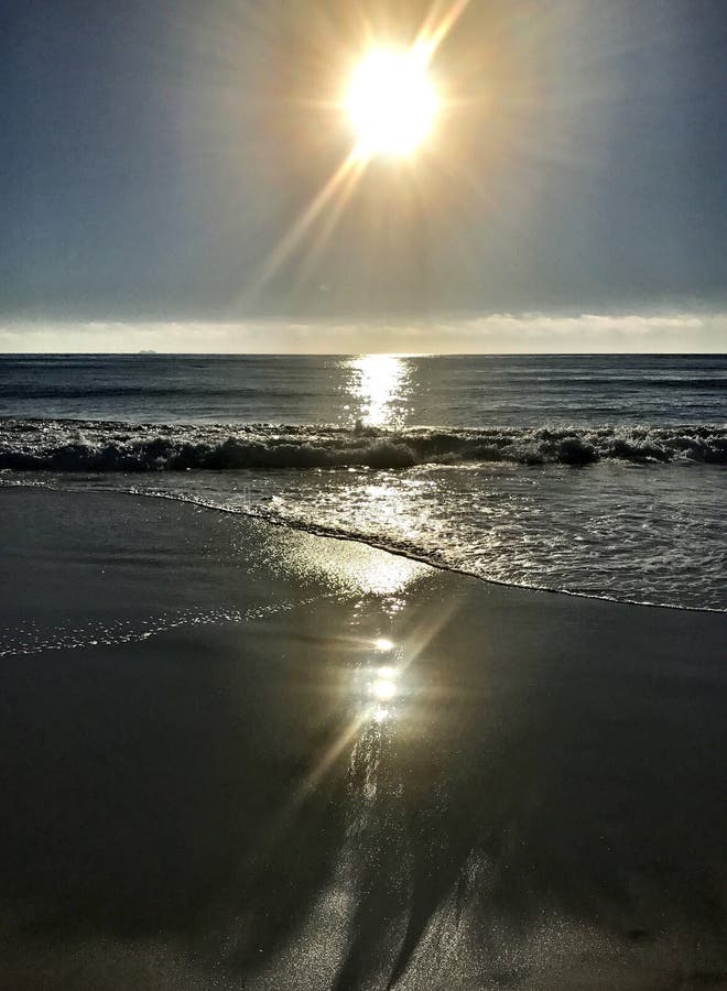 Ocean and solar eclipse stock photo. Image of water - 101818380