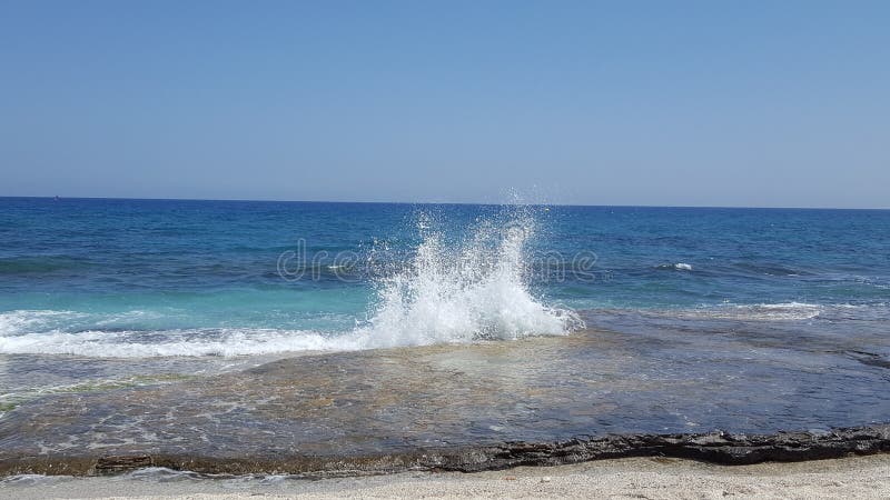 Ocean Spray Hitting the Wet Lava Rocks on the Peloponnese Peninsula of ...