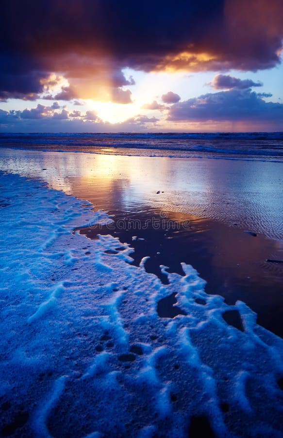 Ocean and sunset stock image. Image of sand, nature, reflection - 1460039