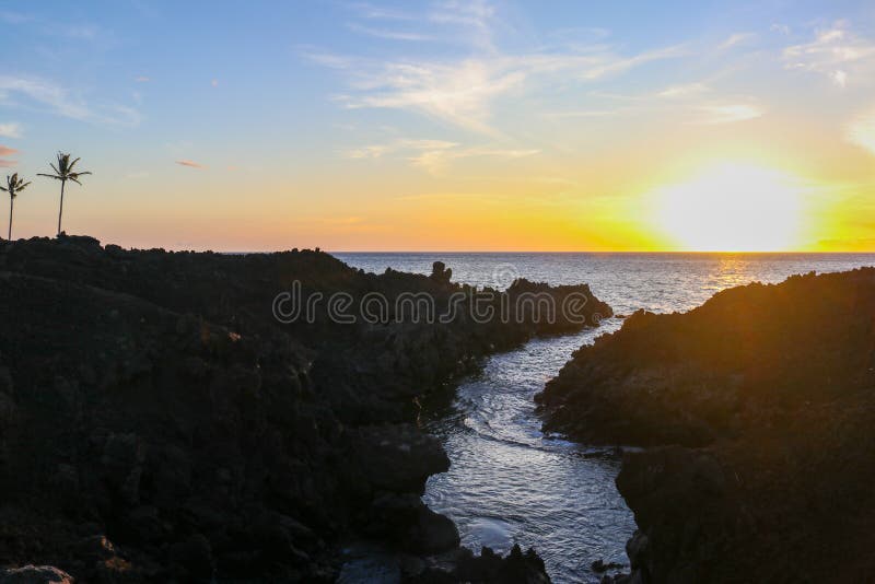 Ocean sunset in Kona stock photo. Image of sunset, rocky - 251064904