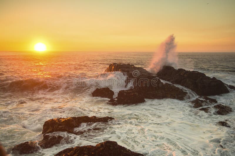 The Ocean Surf on the Rocks during an Awesome Sunset. Nature. Stock ...