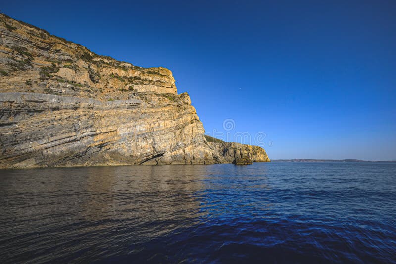 Ocean Surrounded by the Rocky Cliffs - Great for Wallpapers Stock Photo ...
