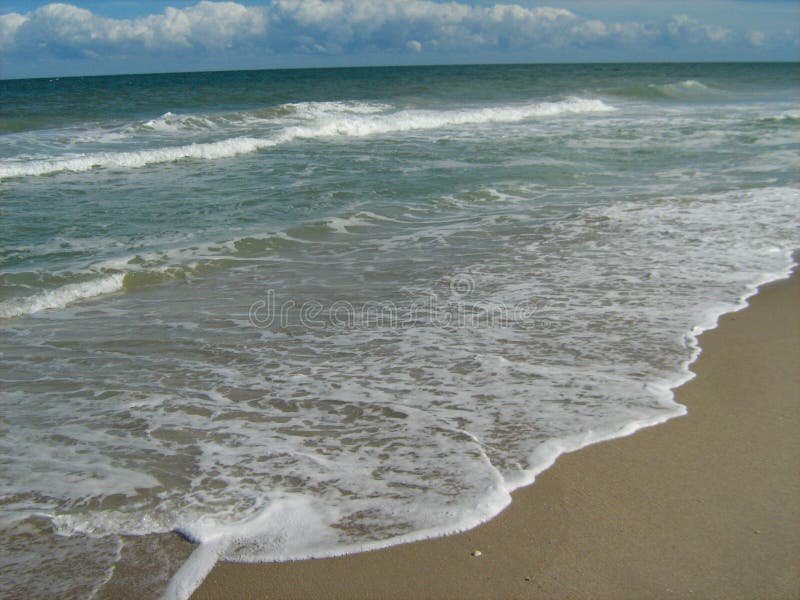 Ocean Tide Coming in stock image. Image of sand, coming - 66292793