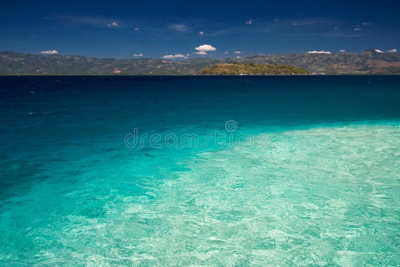 Ocean View of Peaceful Blue Water beside a Beach Stock Photo - Image of ...