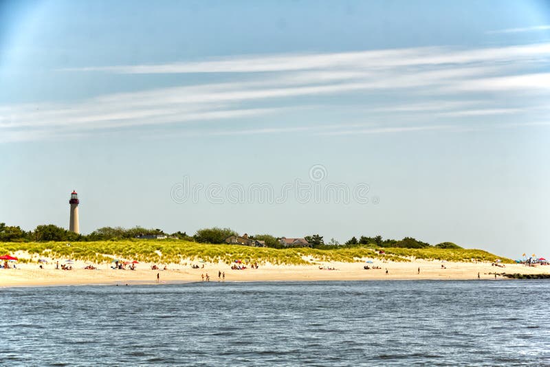 Oceanside with lighthouse stock image. Image of shore - 190261563