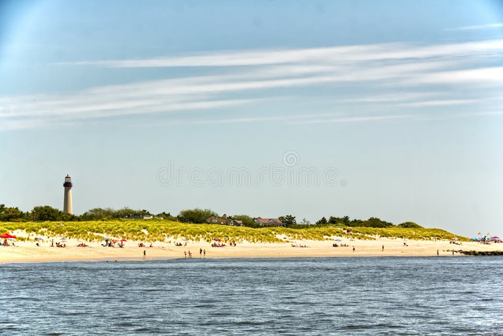 Oceanside with lighthouse stock image. Image of shore - 190261563
