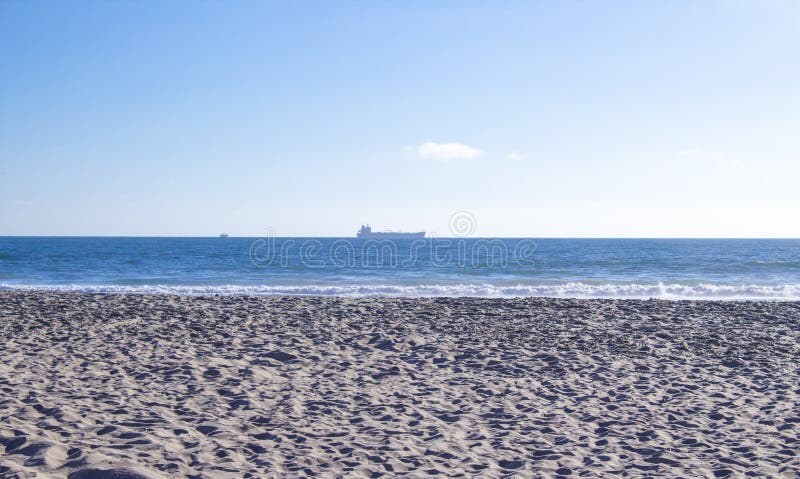 Ocean View Beach Scenery with a Boat in the Distance Stock Photo ...