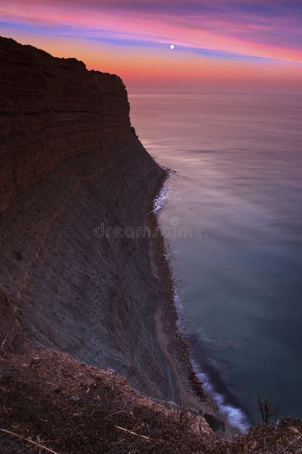 Ocean view at sunset stock image. Image of moon, ocean - 12877835