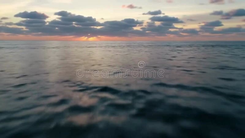 Ocean View at Sunset with Clouds Reflecting on the Water Surface Aerial ...
