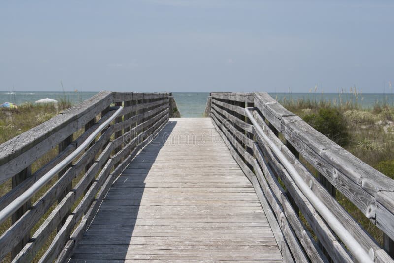 Ocean walkway with ladder stock image. Image of gloaming - 268945119