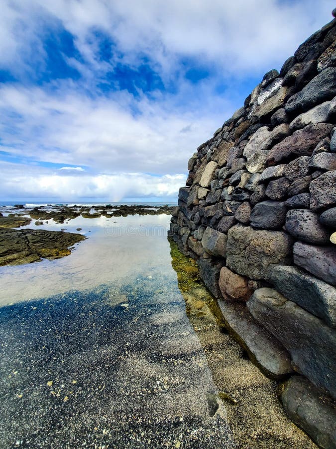 Ocean and rock wall stock photo. Image of rock, beach - 55546720