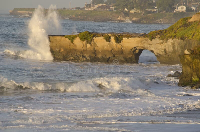 Ocean Wave Crashing into Natural Bridge Stock Image - Image of power ...