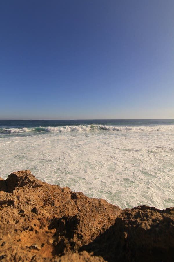 Ocean Wave on the Edge of the Cliff Stock Photo - Image of coast, water ...