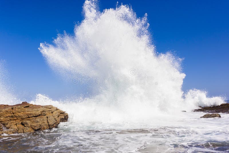 Ocean Wave Exploding Rocks stock image. Image of rocks - 60861911