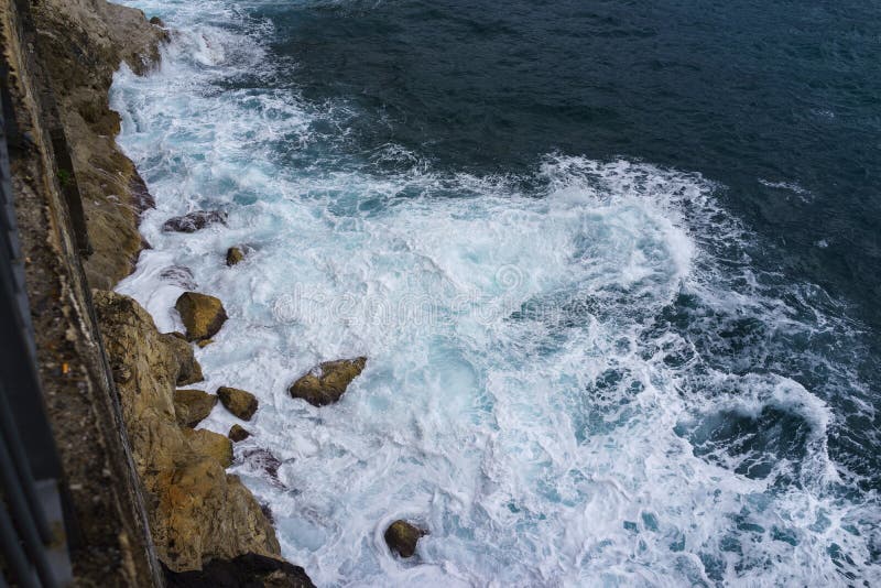 Ocean Wave Hit the Cliff on Rock Coast with Spray and Foam Befor Stock ...