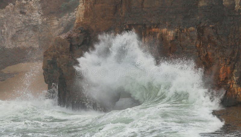 Ocean Wave in the Pacific Ocean Crashing on Rocks during a Storm Stock ...