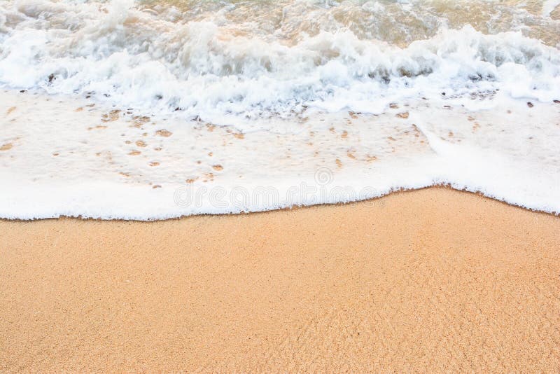 Ocean wave on sandy beach stock photo. Image of people - 111410782