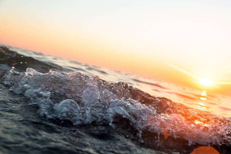Ocean wave at sunset stock photo. Image of side, reflection - 46288126