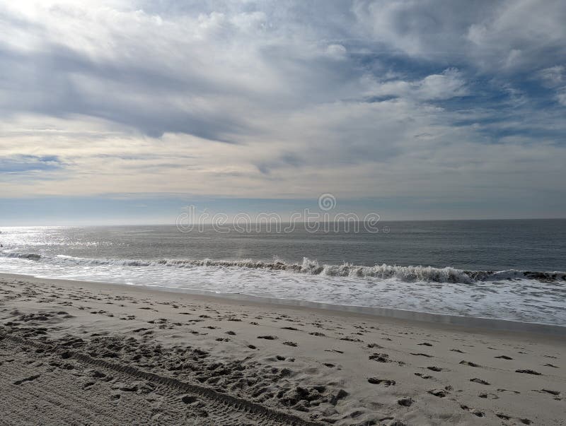 Ocean Waves on Beach Clouds Sand Stock Image - Image of sand, ocean ...