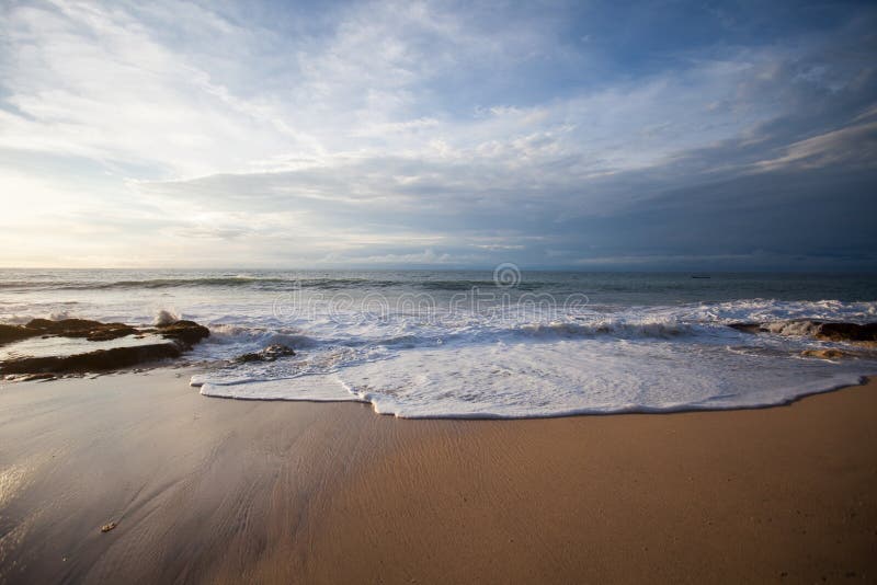 Ocean Waves Breaking on the Rocks on the Beach Stock Photo - Image of ...