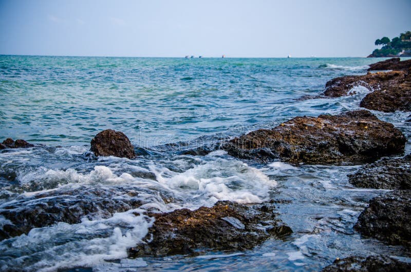 Ocean Waves Breaking on the Rocks on the Shore. Stock Photo - Image of ...