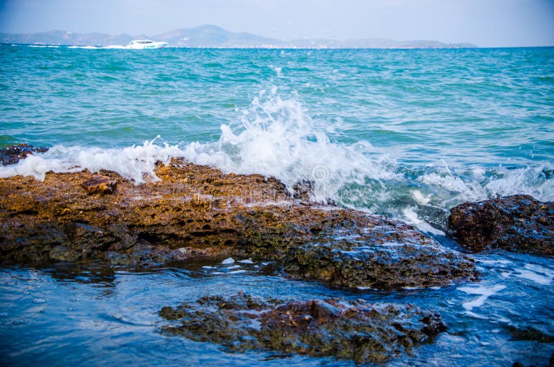 Ocean Waves Breaking on the Rocks on the Shore. Stock Image - Image of ...