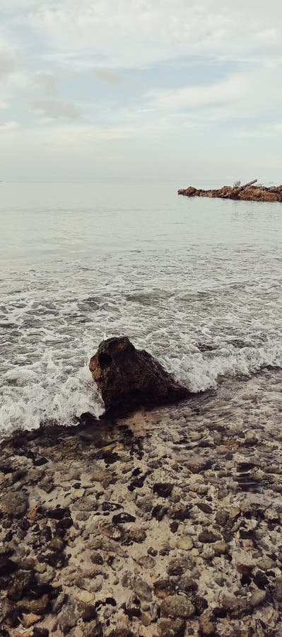 Ocean Waves on a Coral Reef, on a Calm Afternoon on a Beach Stock Image ...