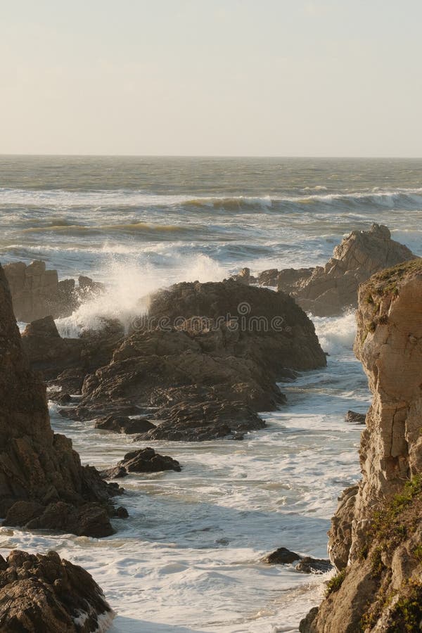 Ocean Waves Hitting Rocks Along the Coast Stock Photo - Image of spray ...