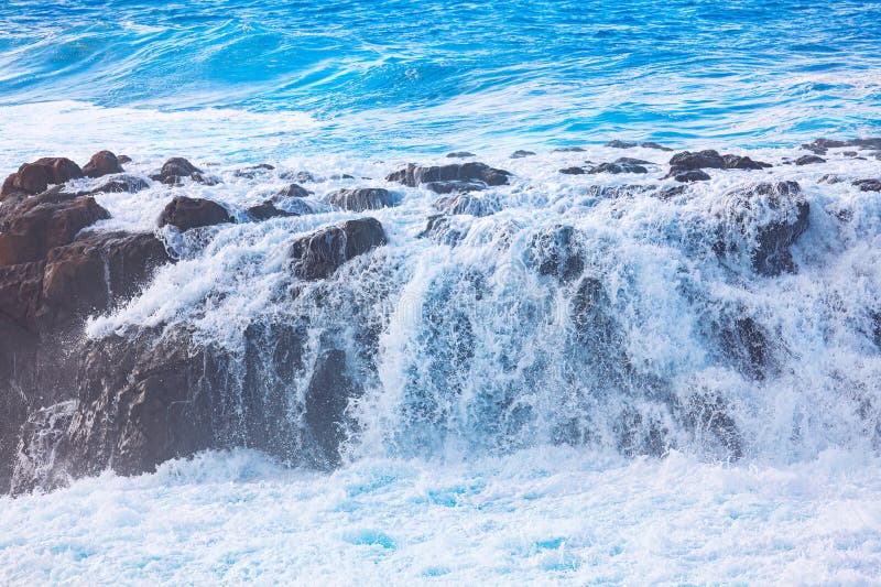 Ocean waves over rocks stock image. Image of turquoise - 274821199
