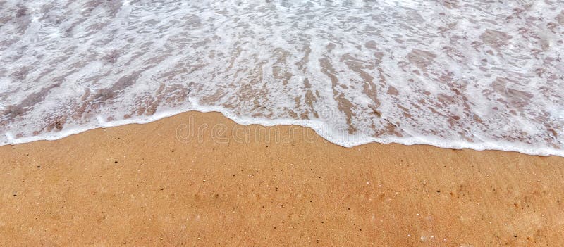 Ocean Waves Retreating on Sandy Shore Stock Image - Image of foamy ...