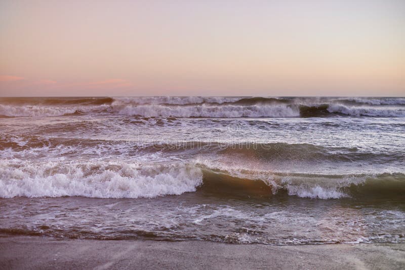 Ocean waves on sunset time stock image. Image of orange - 88304115