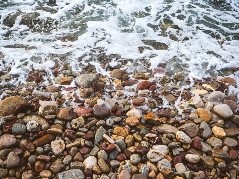 Ocean Waves Wtih Round Stone Beach Stock Image - Image of beautiful ...