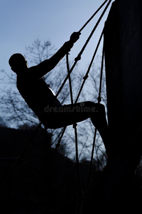 OCR Competition, Obstacle Course. Athletes Climbing a Wall Stock Image ...
