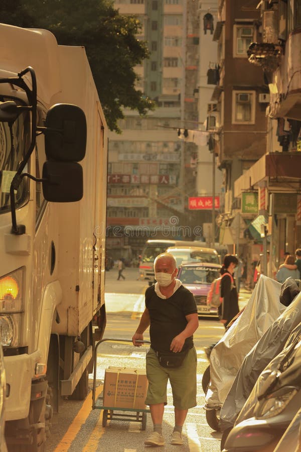 10 Oct 2020 Male Movers Unloading Boxes from Van Outdoors Editorial ...