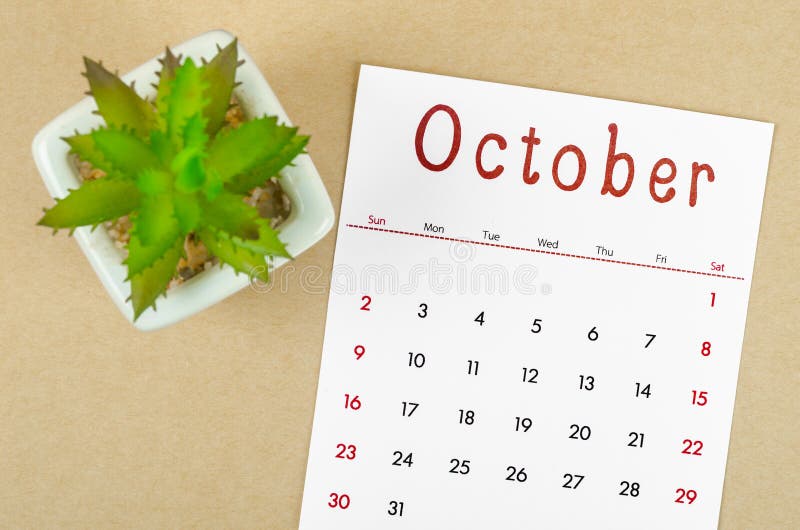 October 2022 Calendar with Plant Pot on Brown Paper Background Stock ...