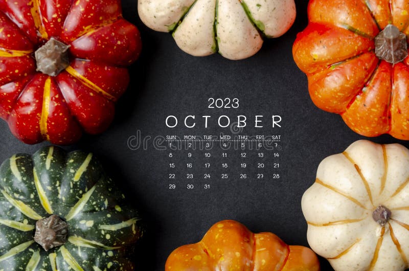 The October 2023 Calendar and Pumpkins on Wooden Color Background Stock ...