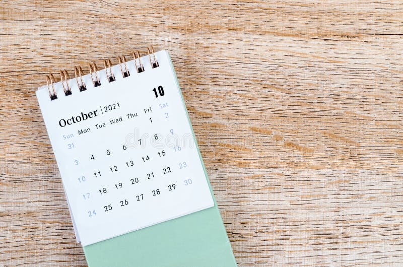 October 8 on the Calendar and a Bouquet of Bright Autumn Leaves on the ...