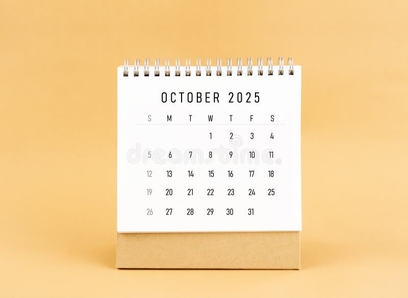 October 2025 Desk Calendar on Yellow Background, Front View Stock Photo ...